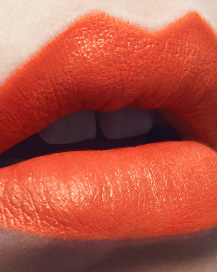 reddish orange lipstick